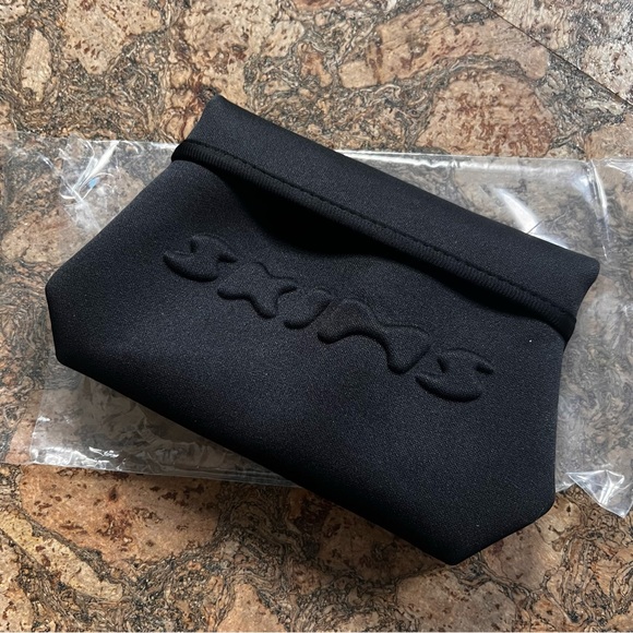 SKIMS | Bags | Nwt Skims Small Neoprene Pouch | Poshmark